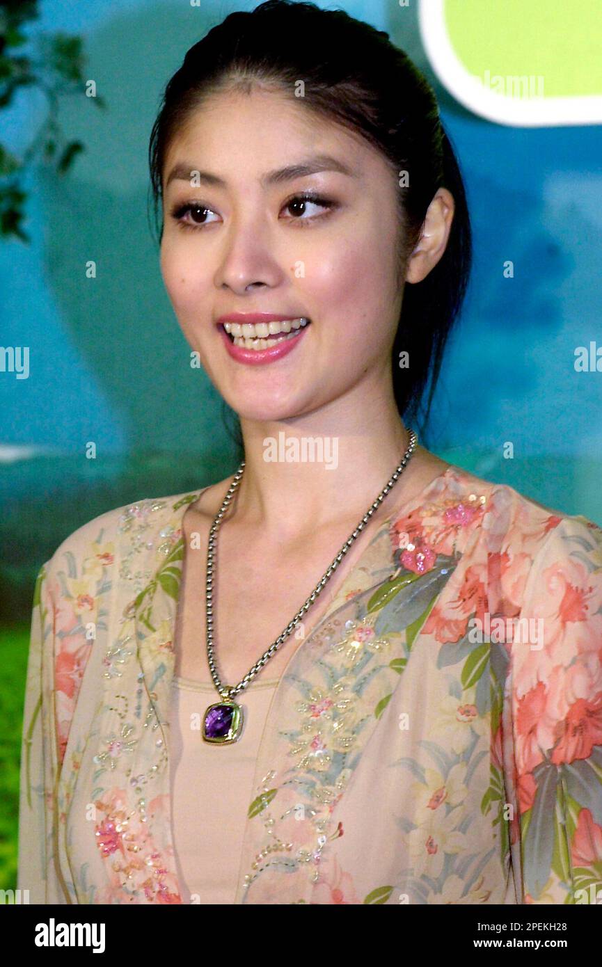Hong Kong singer Kellly Chen poses for photographers at a McDonald's ...