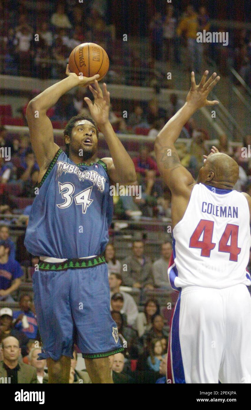 Minnesota Timberwolves center Michael Olowokandi (34) shoots over ...
