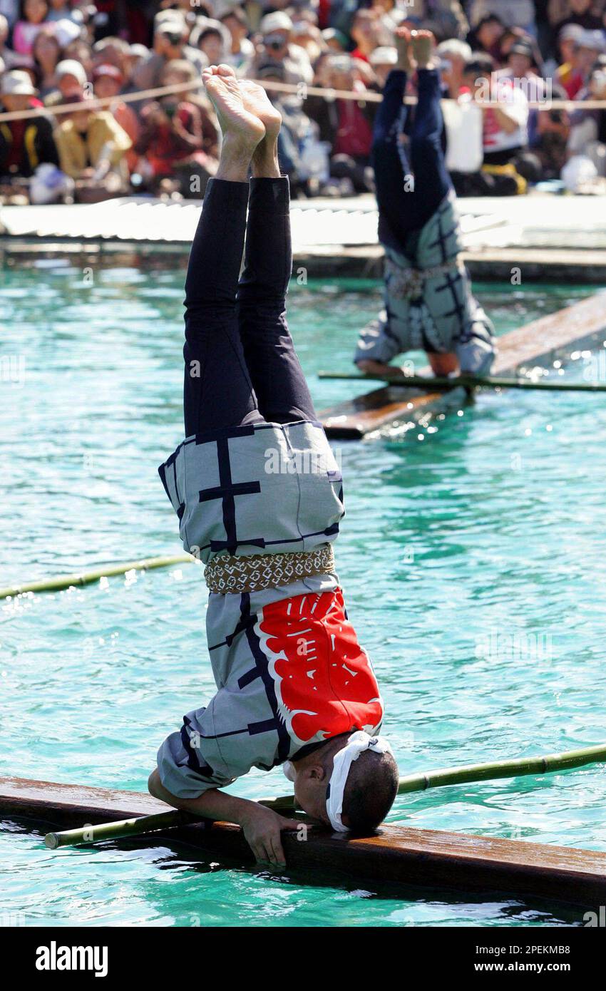 Amateur stunt performers in traditional lumberman costume stand wrong ...