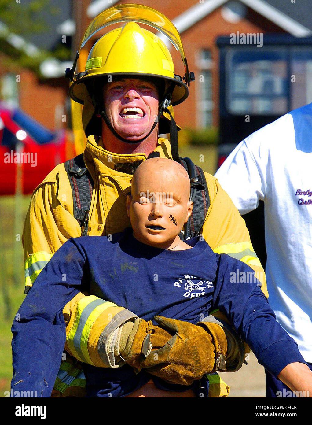 FirefighterJack Hale drags a 175lb dummy during the last leg of the ...