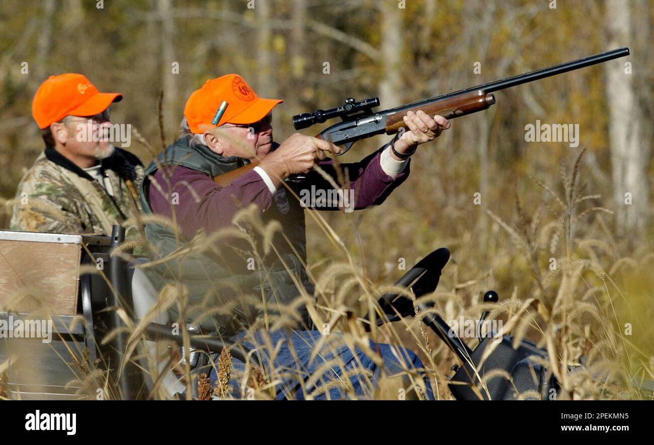 Disabled hunter Jay Johnson of Niota, Ill., shoots a pheasant early ...