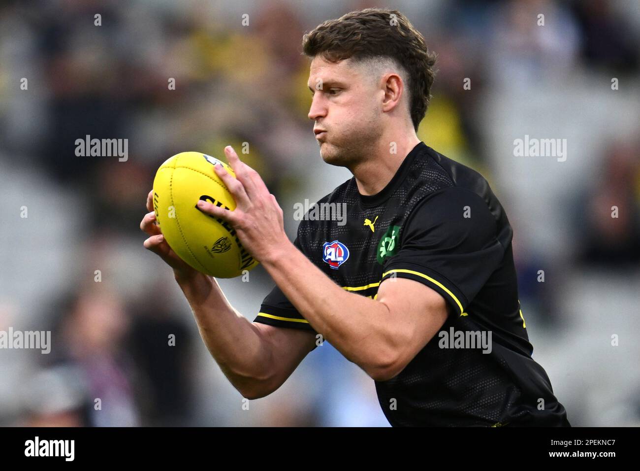 Jacob Hopper of Richmond warms up during the AFL Round 1 match between ...