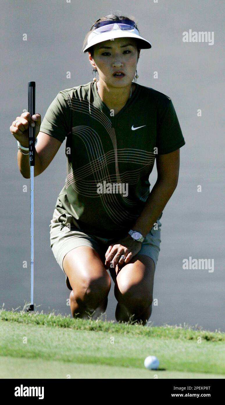 Grace Park of South Korea lines up a putt during the Samsung World ...