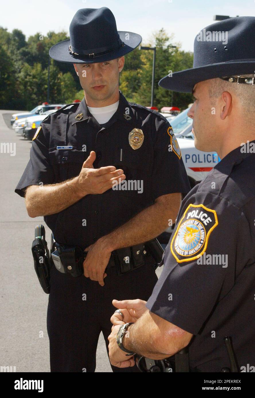 ** ADVANCE FOR SUNDAY, OCT. 17 ** Civilian police officers and brothers ...