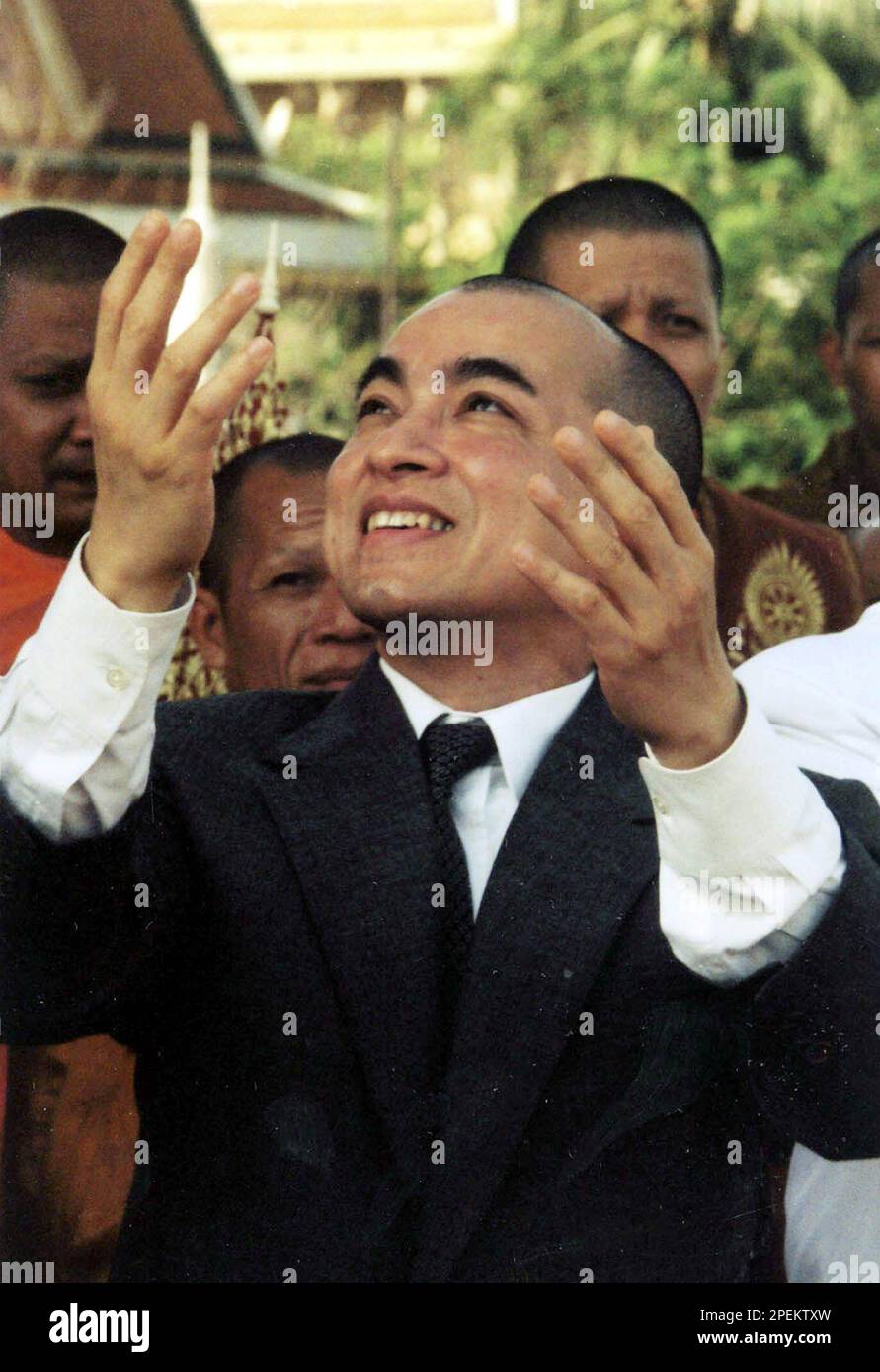 Prince Norodom Sihamoni, one of King Norodom Sihanouk's sons, gestures ...
