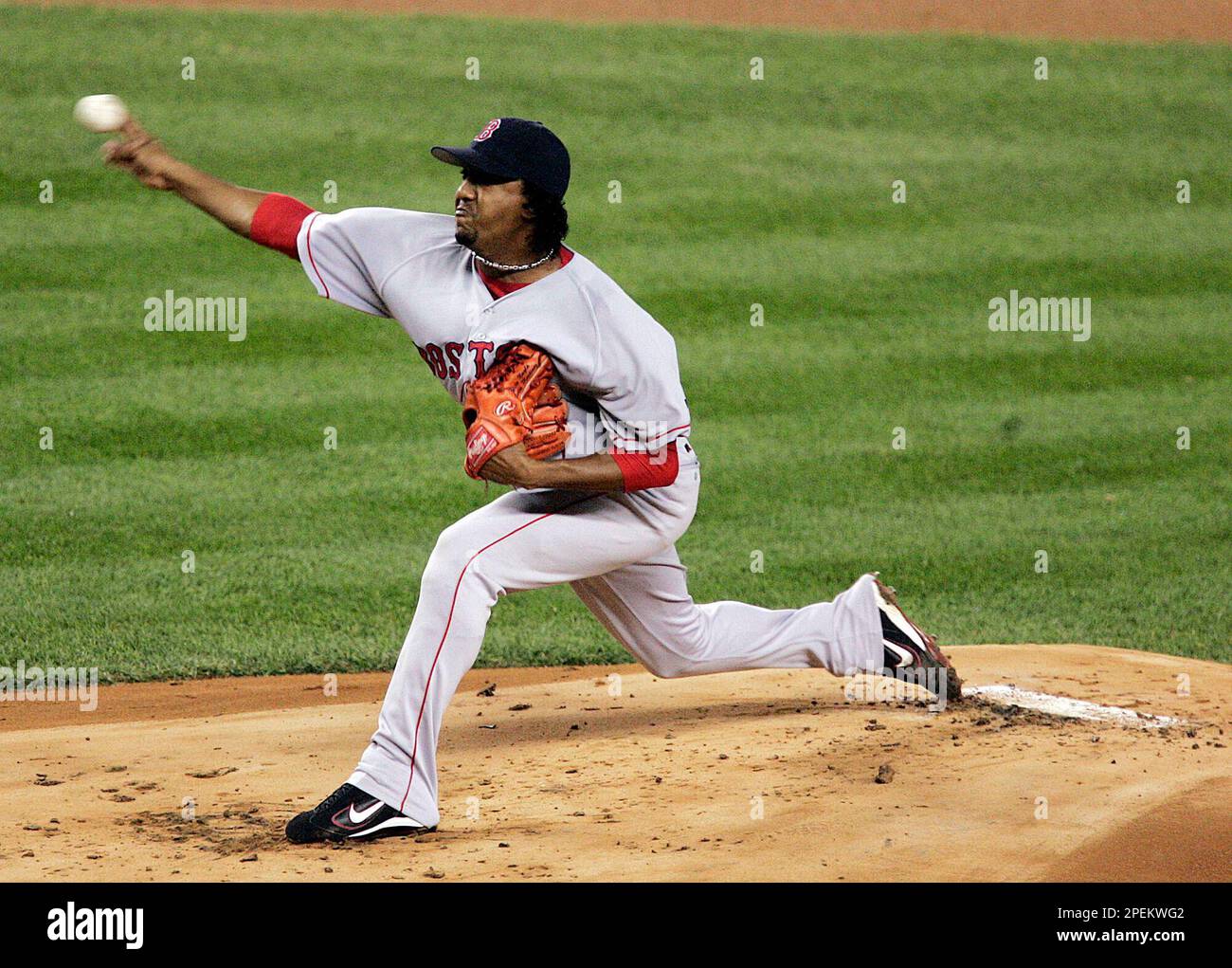 Boston Red Sox pitcher Pedro Martinez fires to the plate against the ...