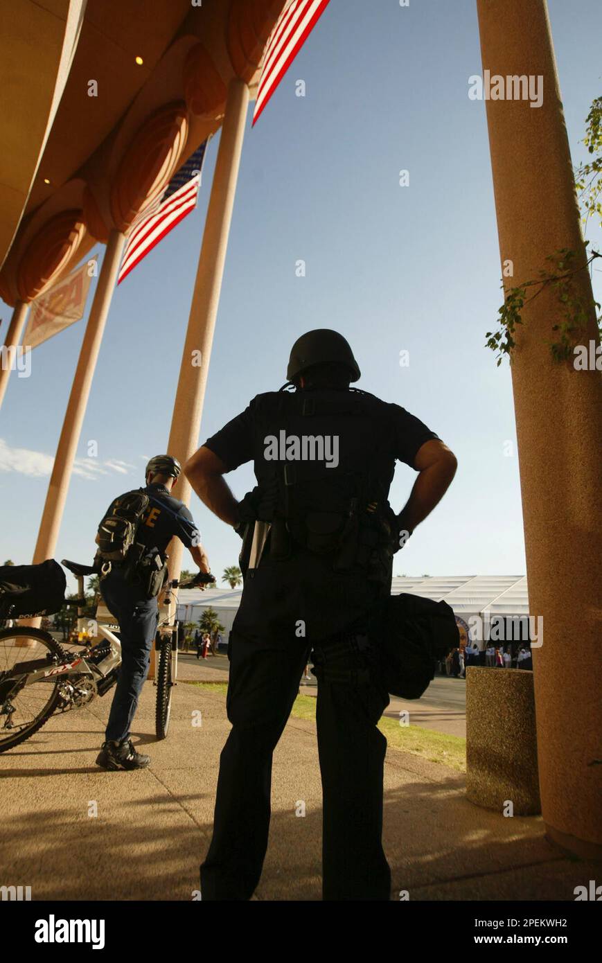 Arizona State University police officer Anthony Camillo, right, and ...