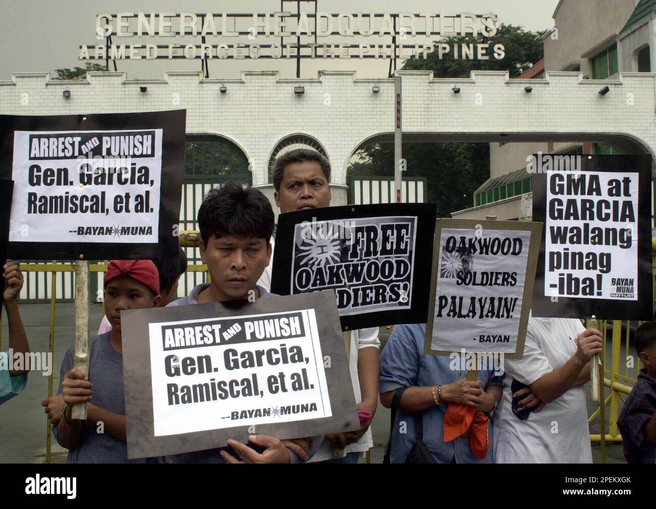 A group of protesters display their placards during an anti-corruption ...