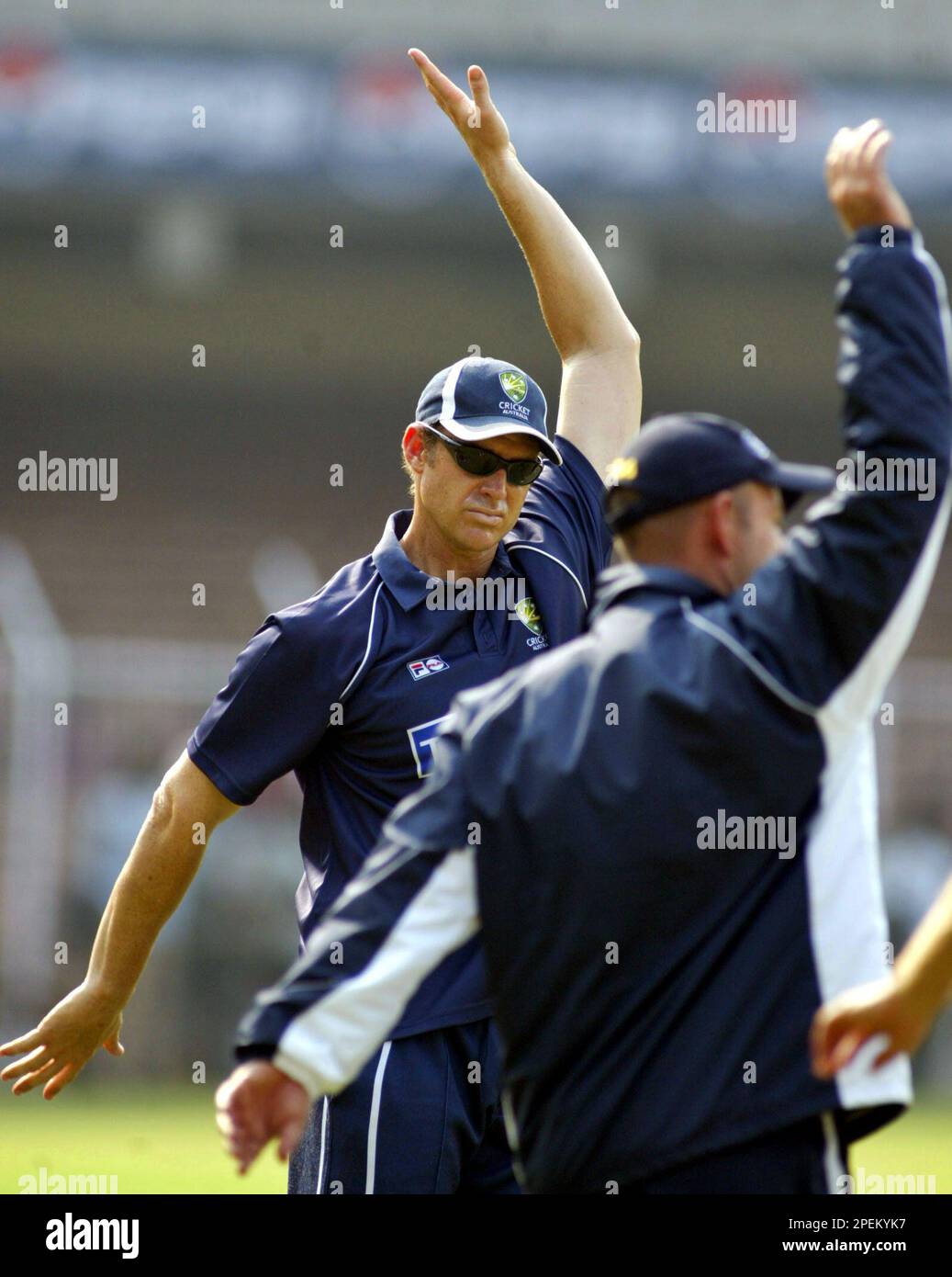 Australia's Mathew Hayden stretches during a practice session in Madras ...