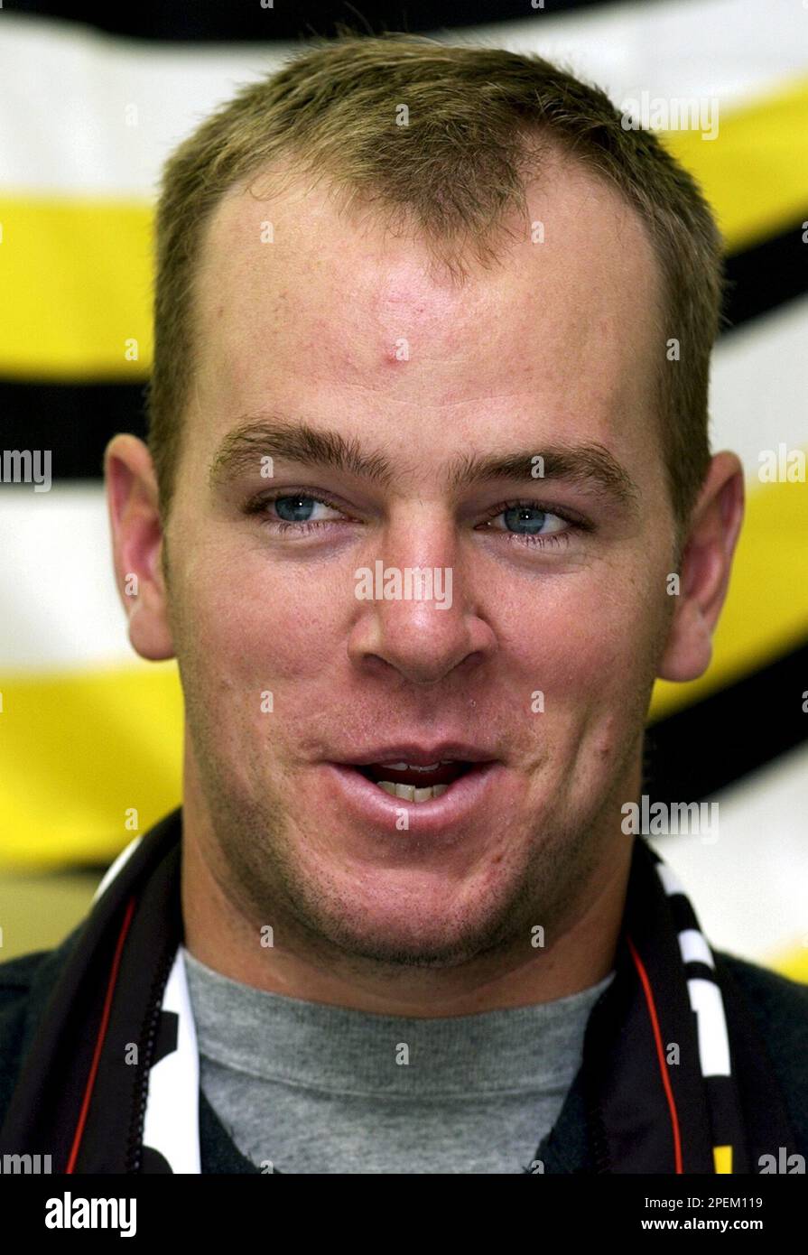Canada's Alex Tanguay poses in front of his new team's logo as he is ...