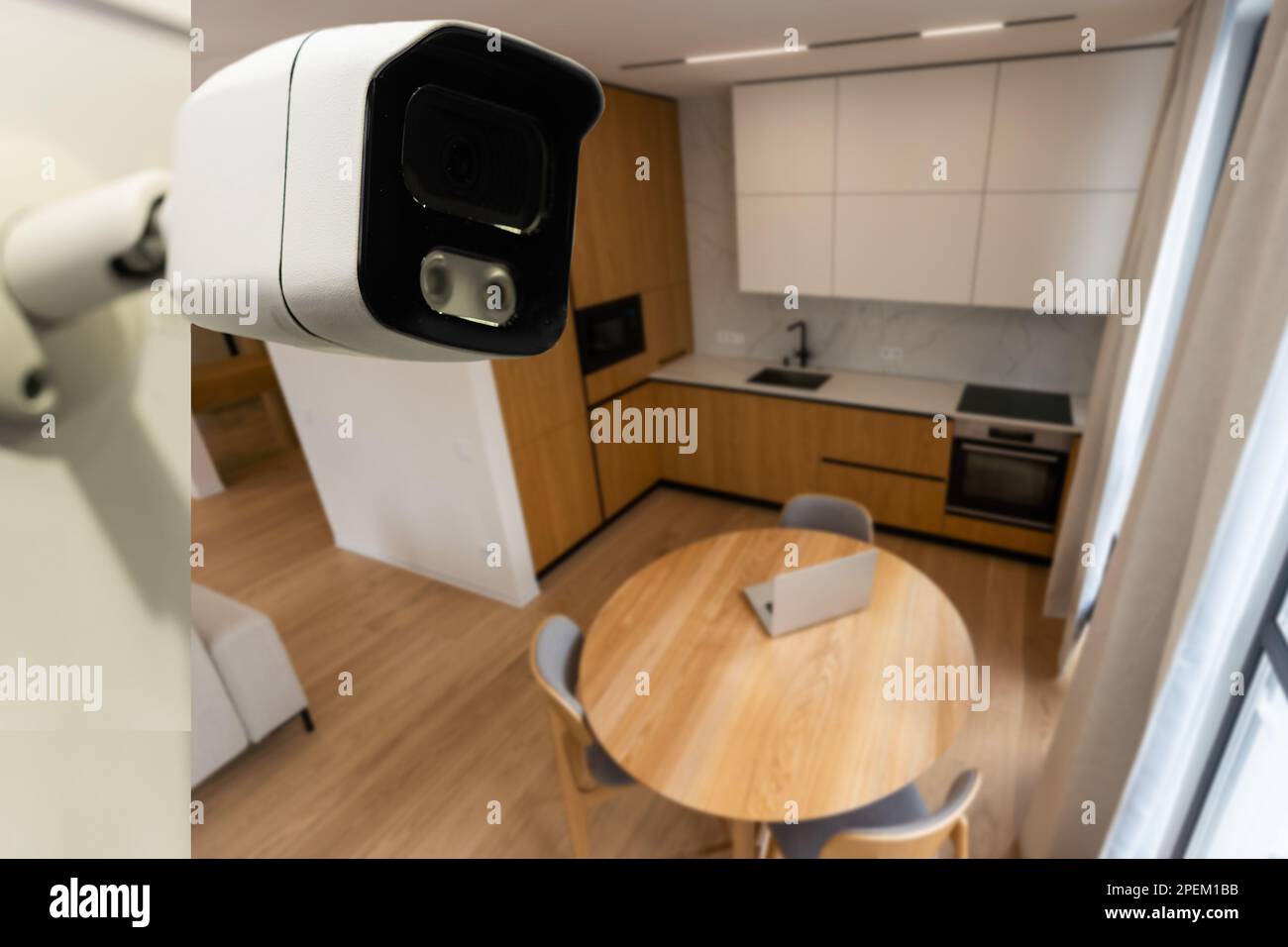 Modern CCTV camera installed in entryway of apartment building Stock ...