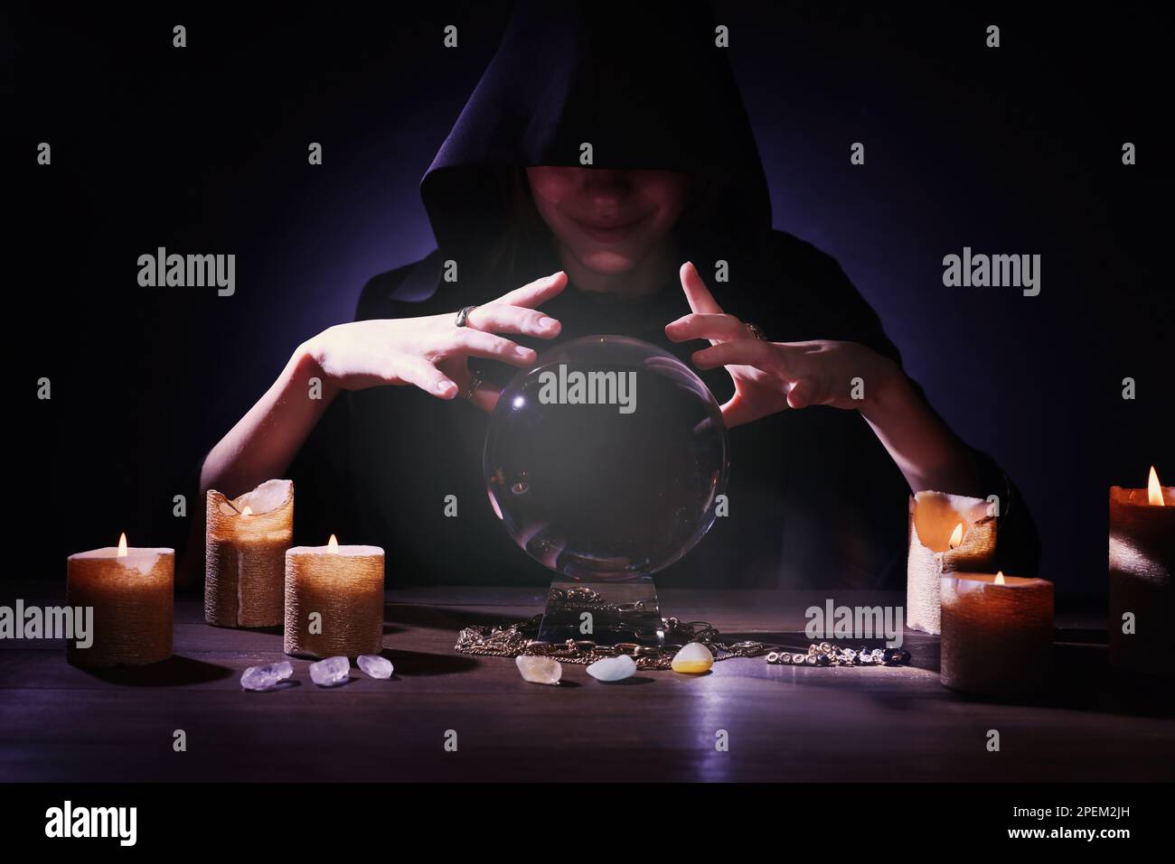 Female fortune teller using crystal hi-res stock photography and images ...