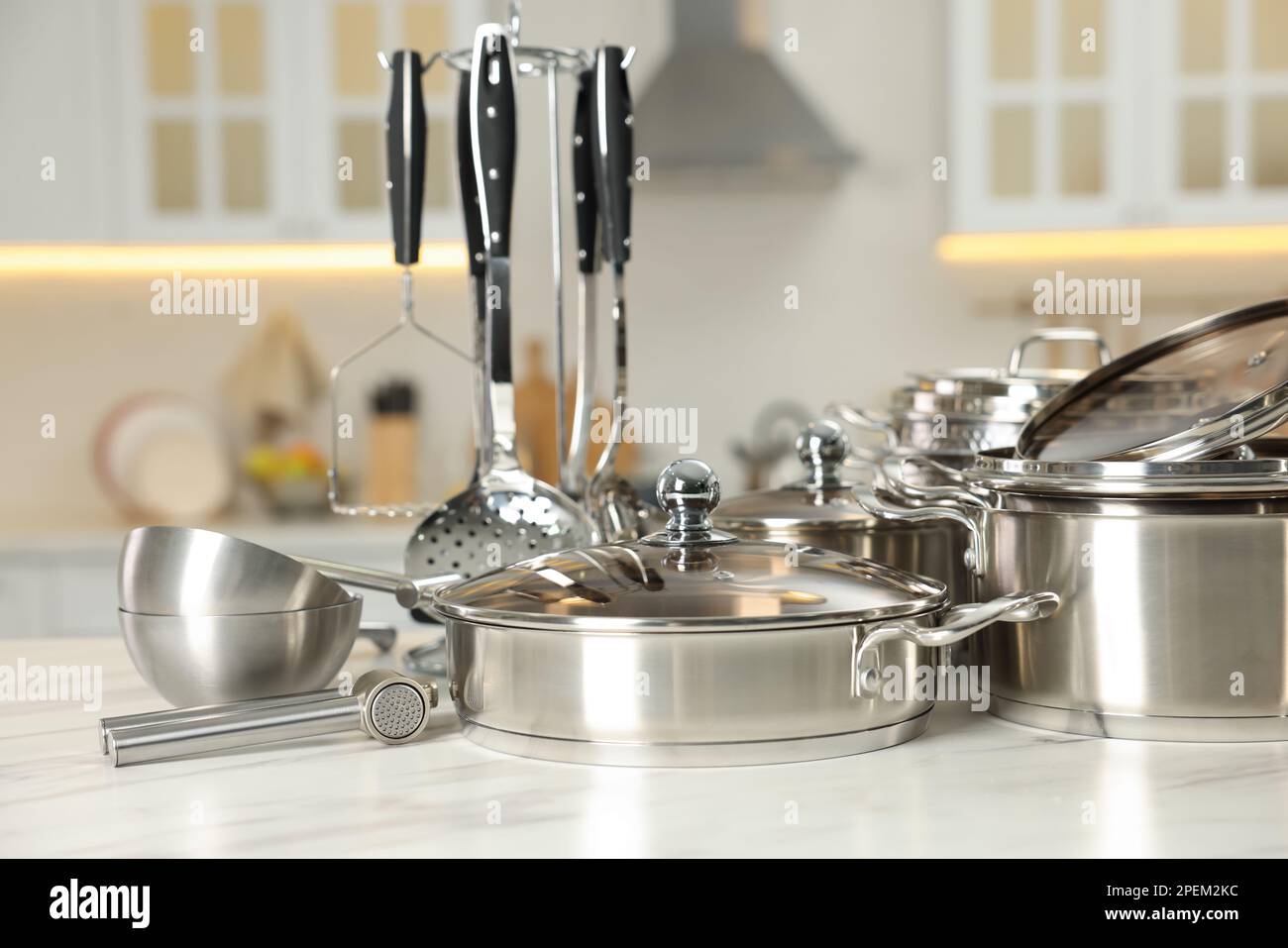 Set shiny cooking utensils hi-res stock photography and images - Alamy