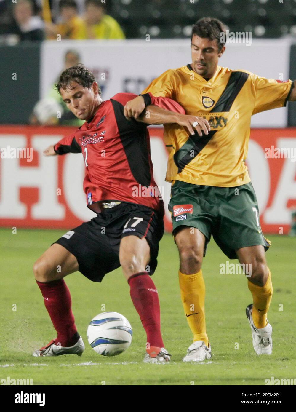 Los Angeles Galaxy's Jovan Kirovski, right, and Dallas Burn's Simo ...