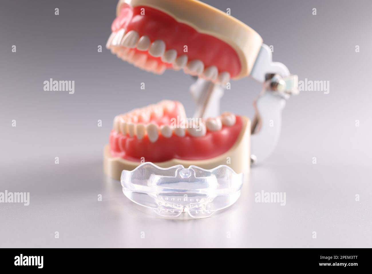 Silicone orthodontic retainers to hold teeth and artificial jaw Stock ...