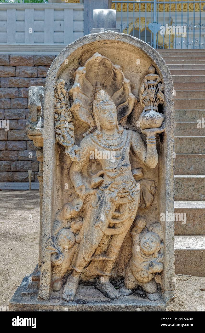 09 10 2007 Guard stone naga raja and two dwarfs carved in one stone at ...