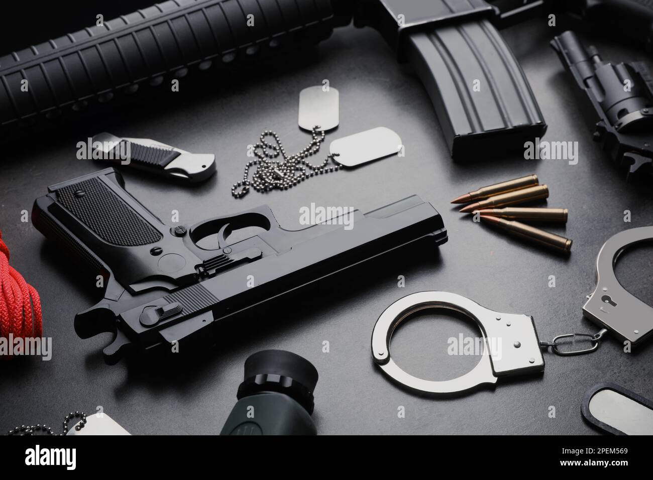 Police handcuffs pistol bullets hi-res stock photography and images - Alamy