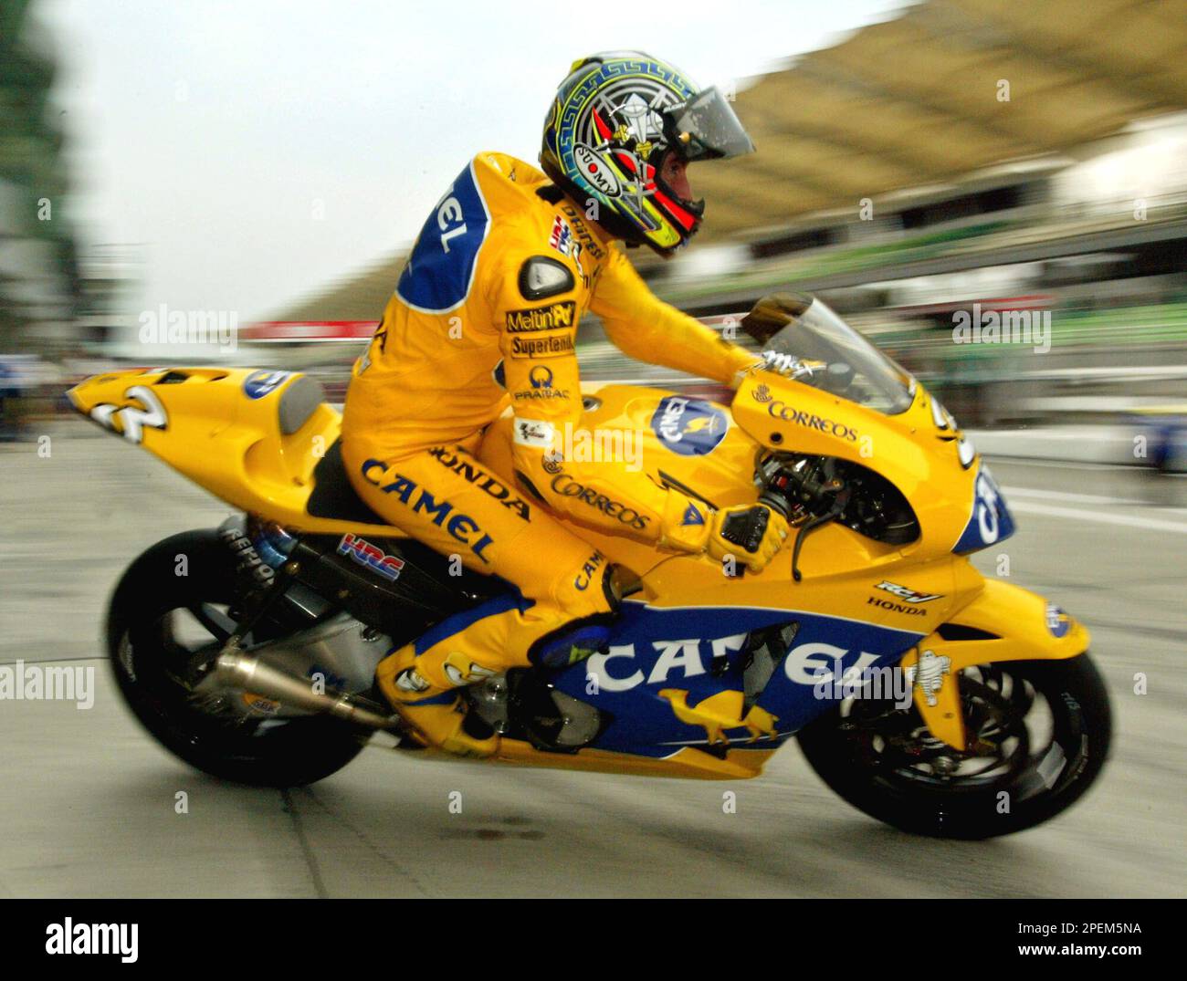 Italian Max Biaggi speeds his Honda during the MotoGP first qualifying ...