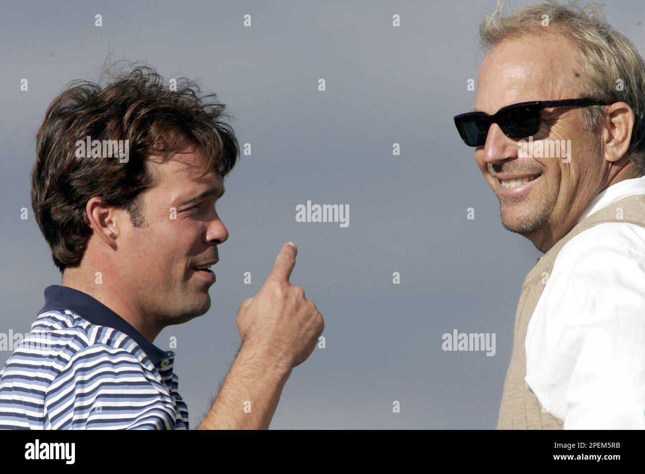 American film star Kevin Costner, right, talks to American singer Clay ...