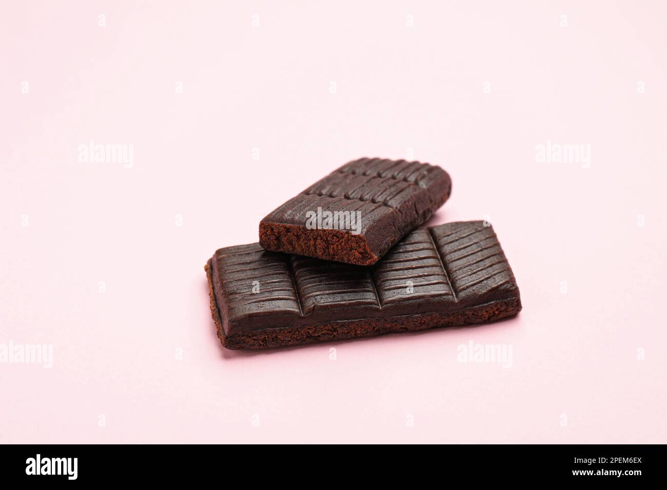 Delicious and healthy hematogen on pink background Stock Photo - Alamy