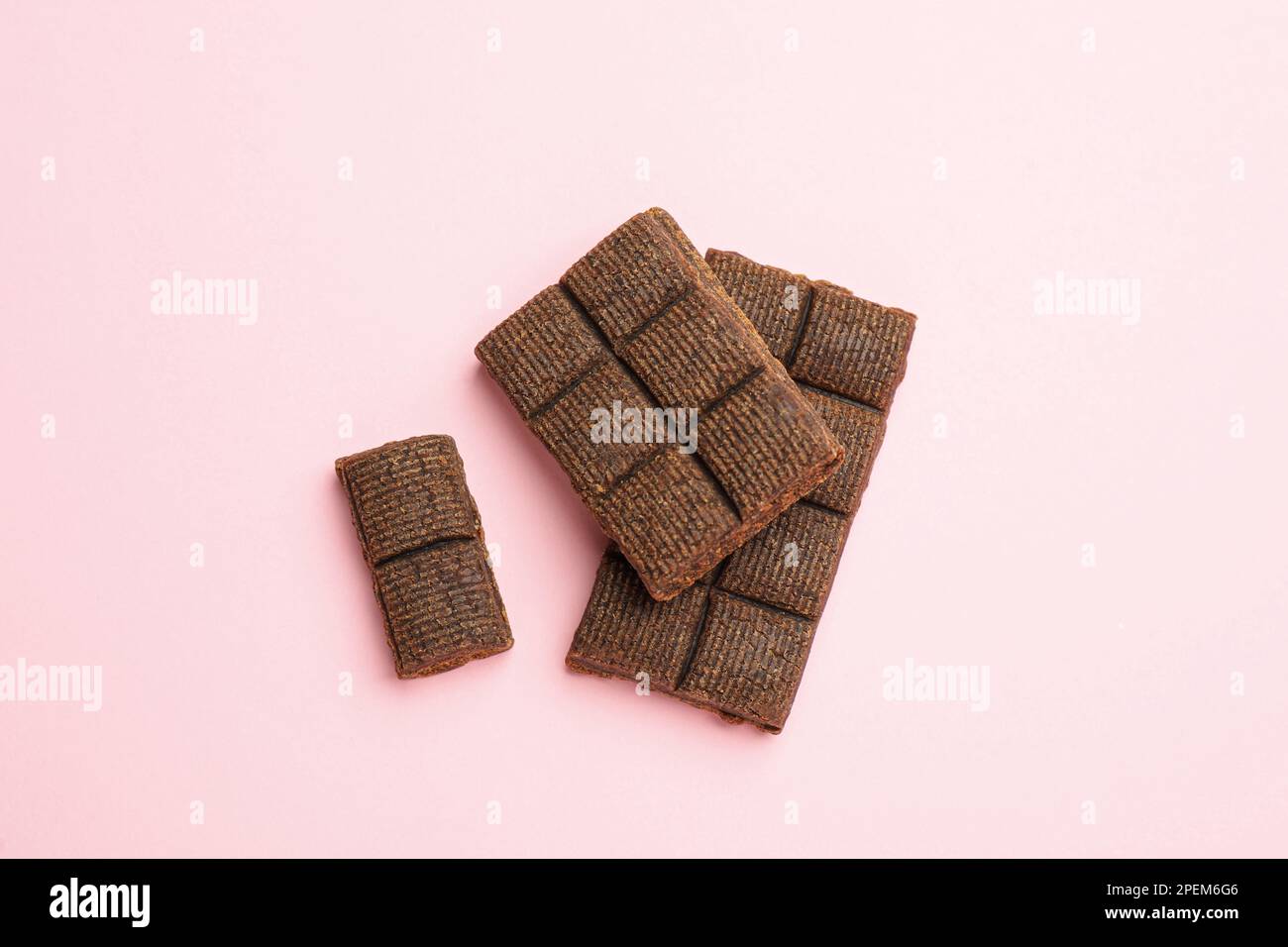 Delicious and healthy hematogen on pink background, flat lay Stock ...