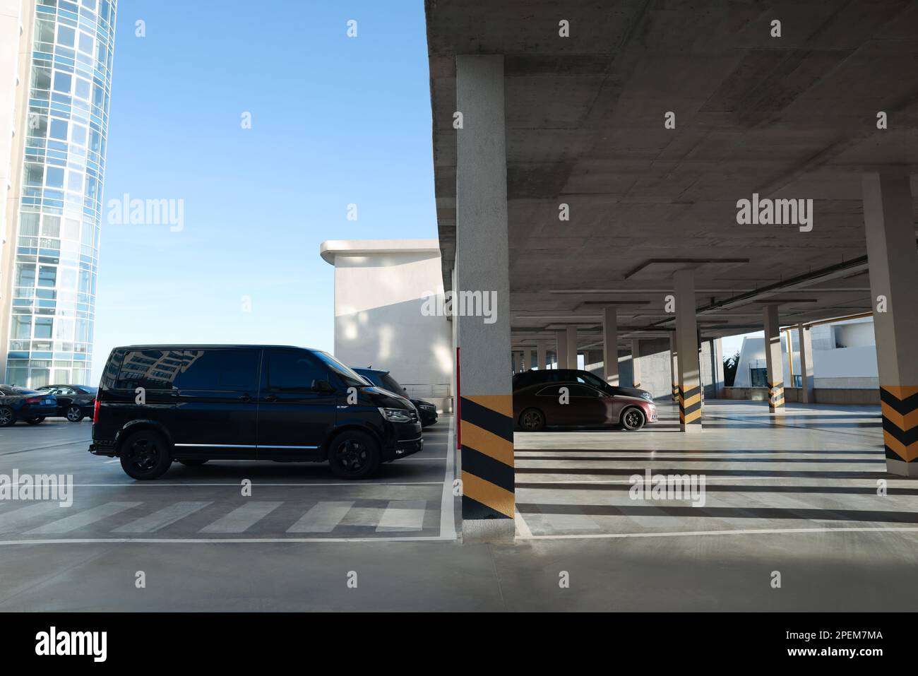 Outdoor parking lot with cars on sunny day Stock Photo - Alamy