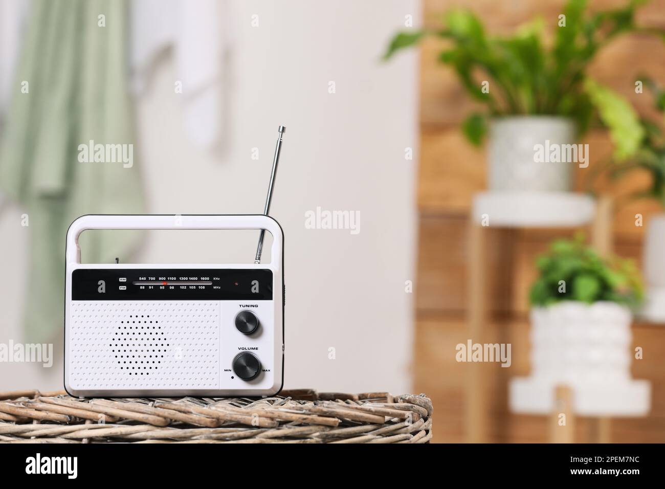 Stylish white radio on wicker stand indoors, space for text Stock Photo ...