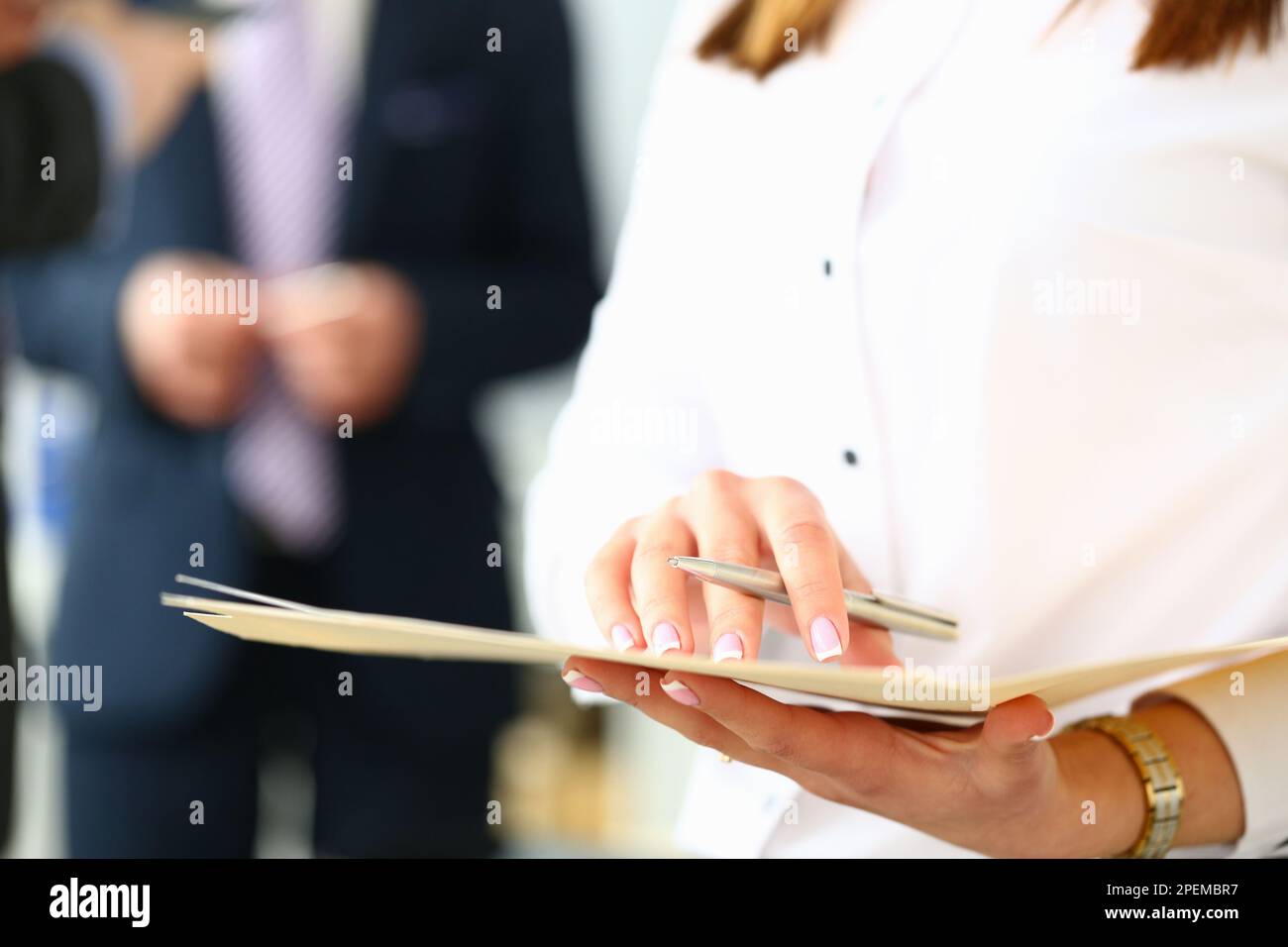 Woman checks paperwork work hi-res stock photography and images - Alamy