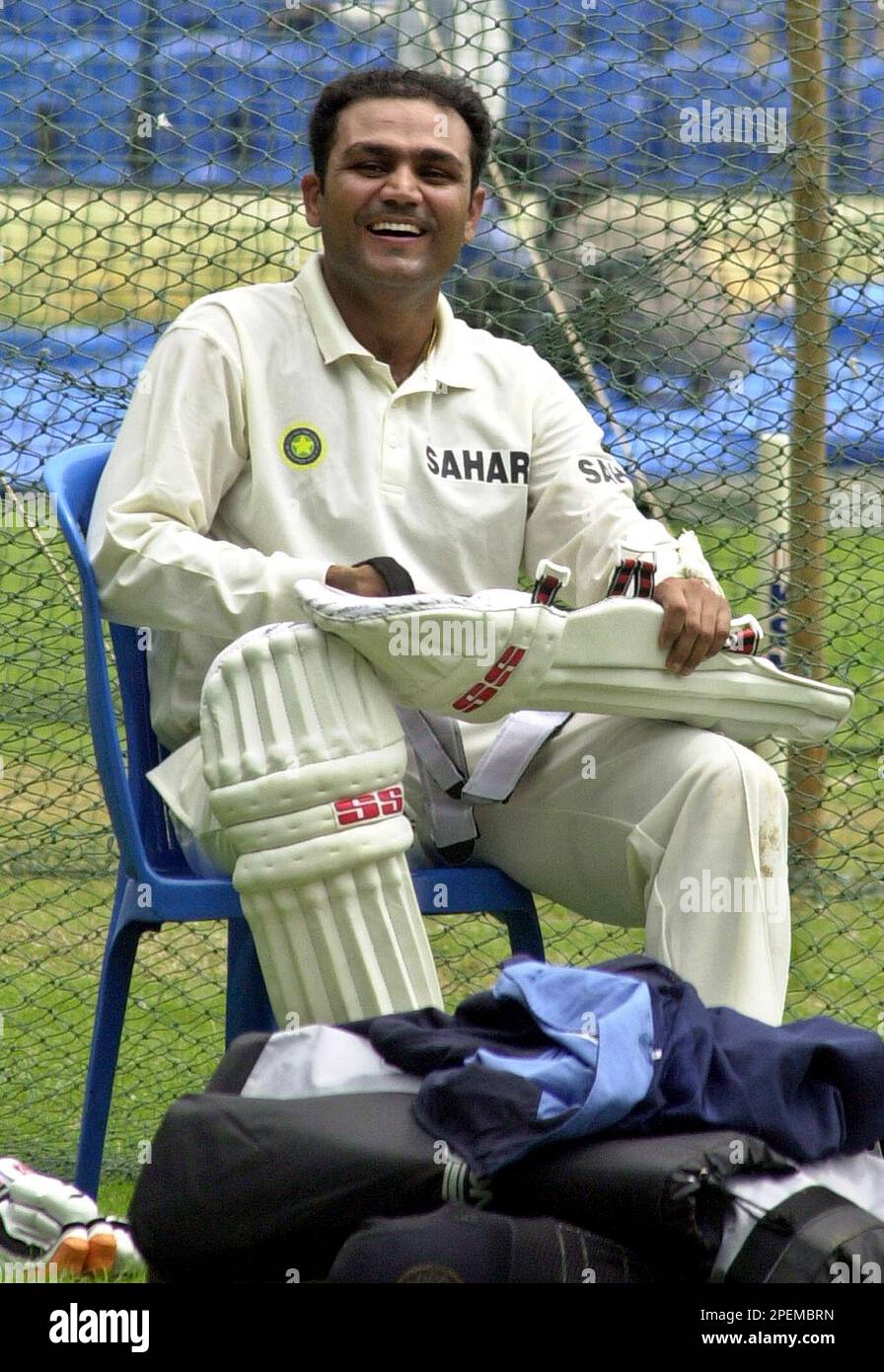 Indian cricketer Virender Sehwag looks on during training session in ...
