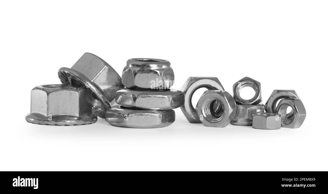 Many different metal nuts on white background Stock Photo - Alamy