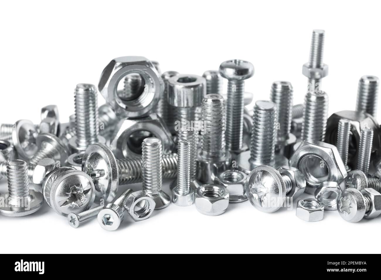 Different metal bolts and nuts on white background Stock Photo - Alamy