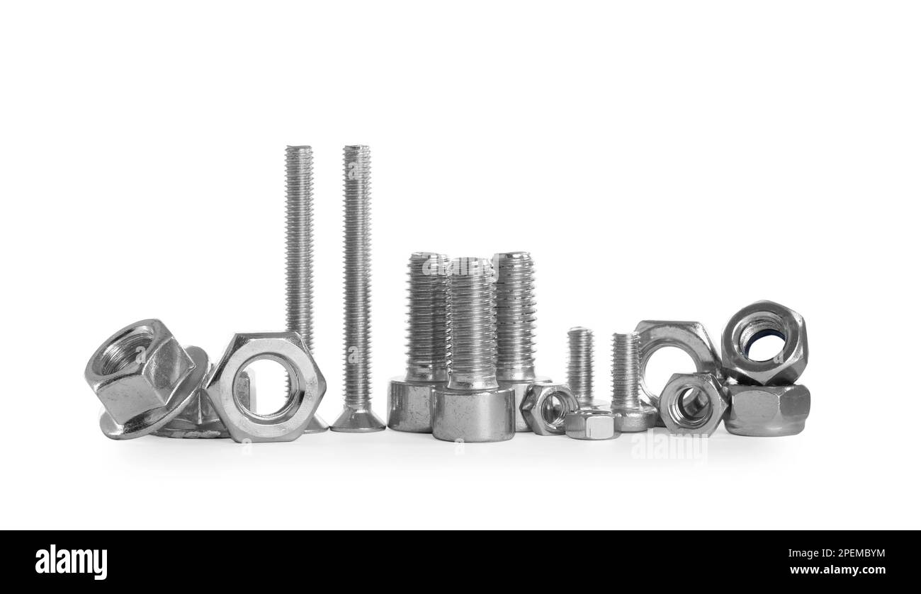 Different metal bolts and nuts on white background Stock Photo - Alamy