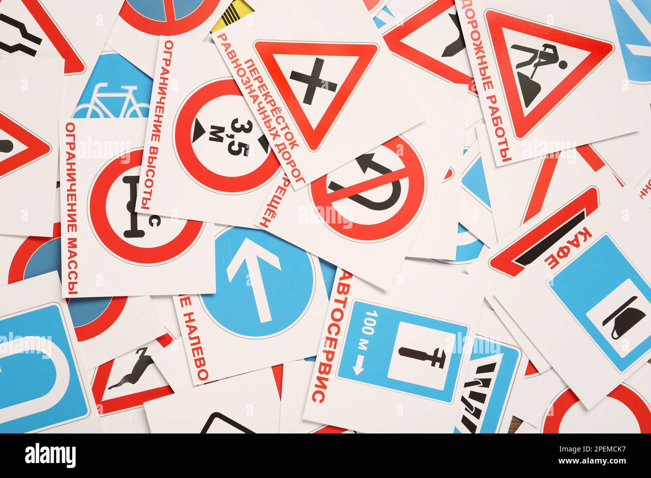 Many different road signs as background, top view. Driving school Stock ...