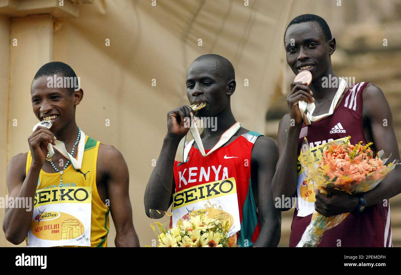 Mens Silver medallist Fabiono Joseph of Tanzania, left, gold medallist ...