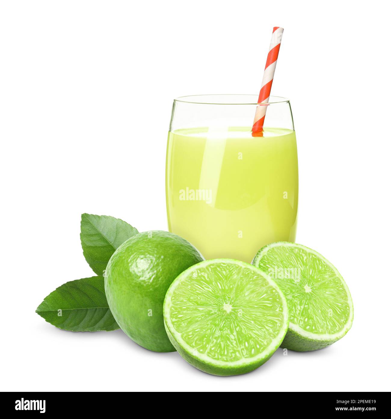 Glass of lime juice, fresh fruits and green leaves on white background ...