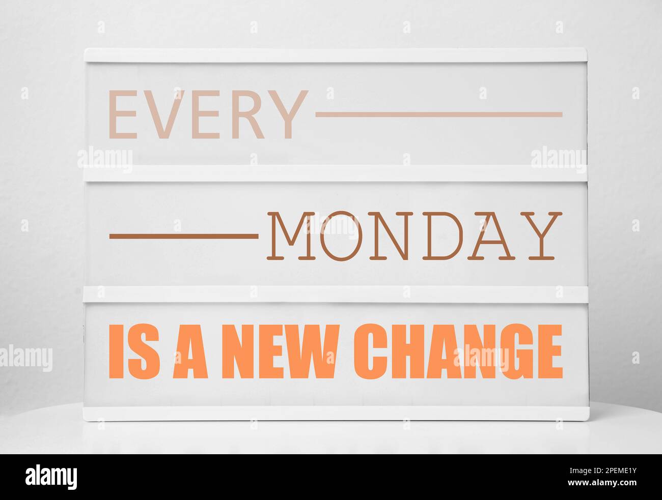 Lightbox with motivational quote Every Monday Is A New Change on white ...