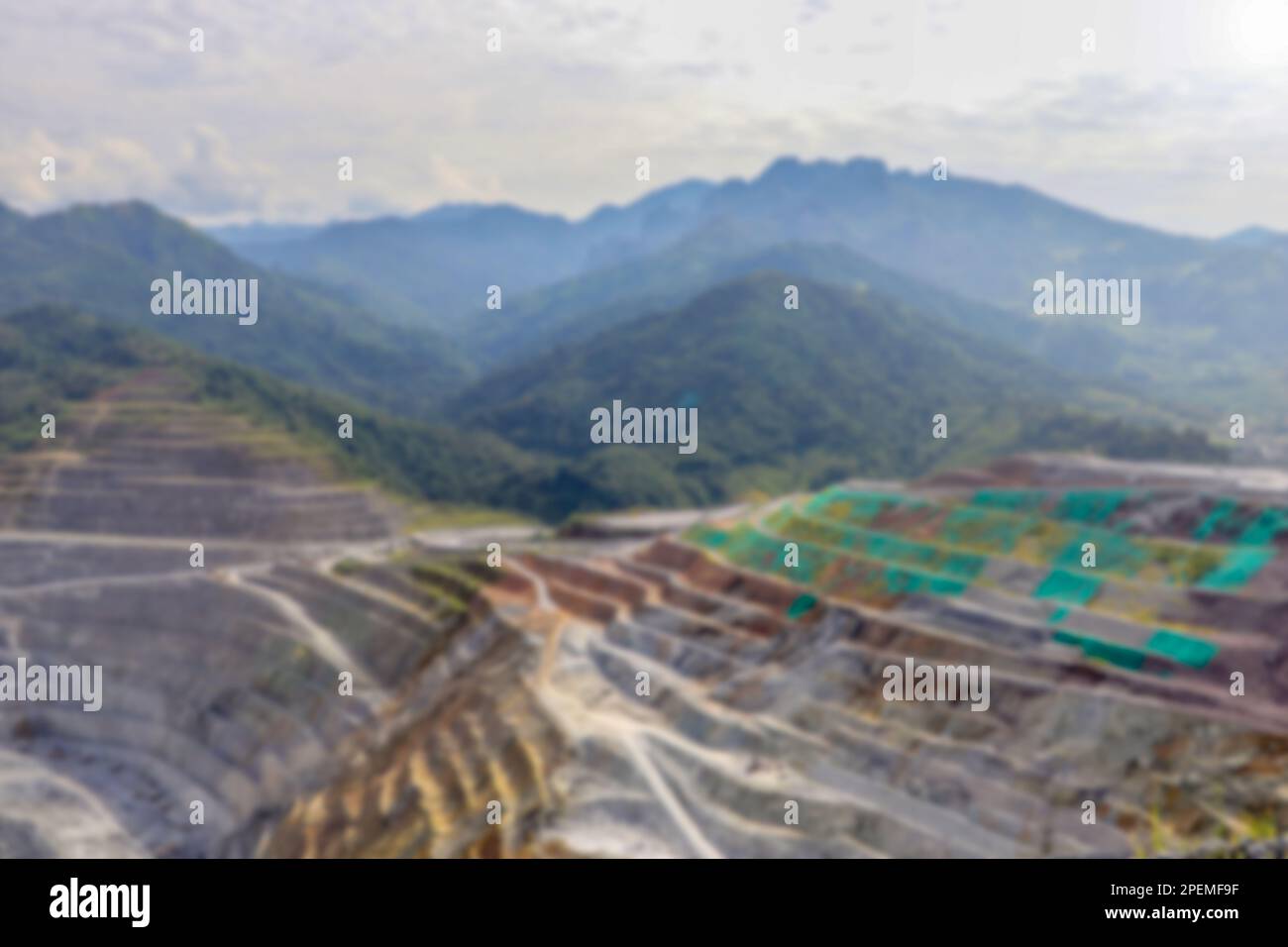 Blurred background of open pit mining. Aerial view of industrial slope ...