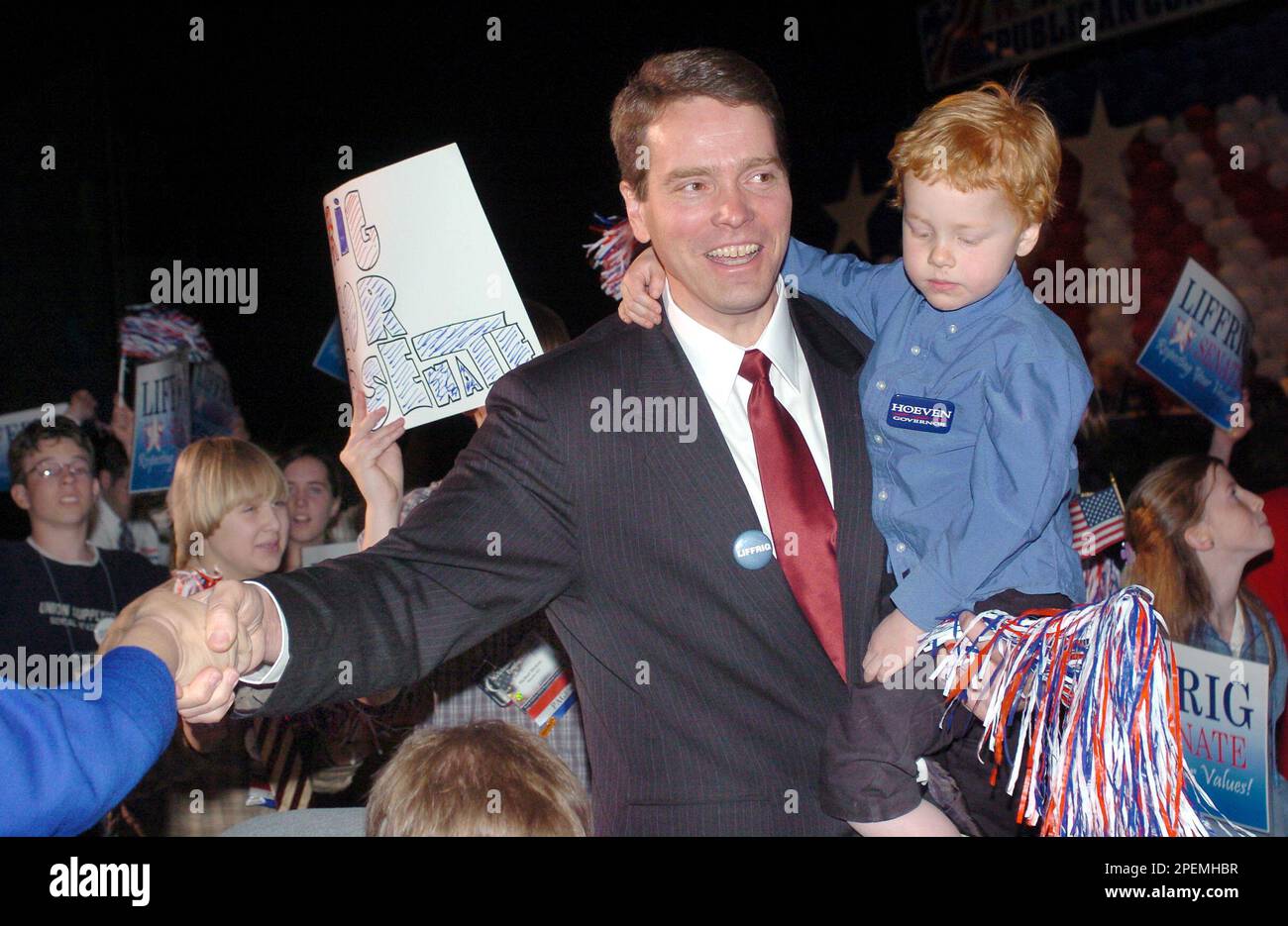 ** ADVANCE FOR SUNDAY, OCT. 3 - FILE ** Mike Liffrig holds his 3-year ...