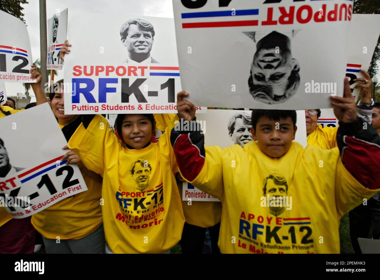 Sheila Enriquez, 9, center, and Luis Navarro 10, right, students at the ...