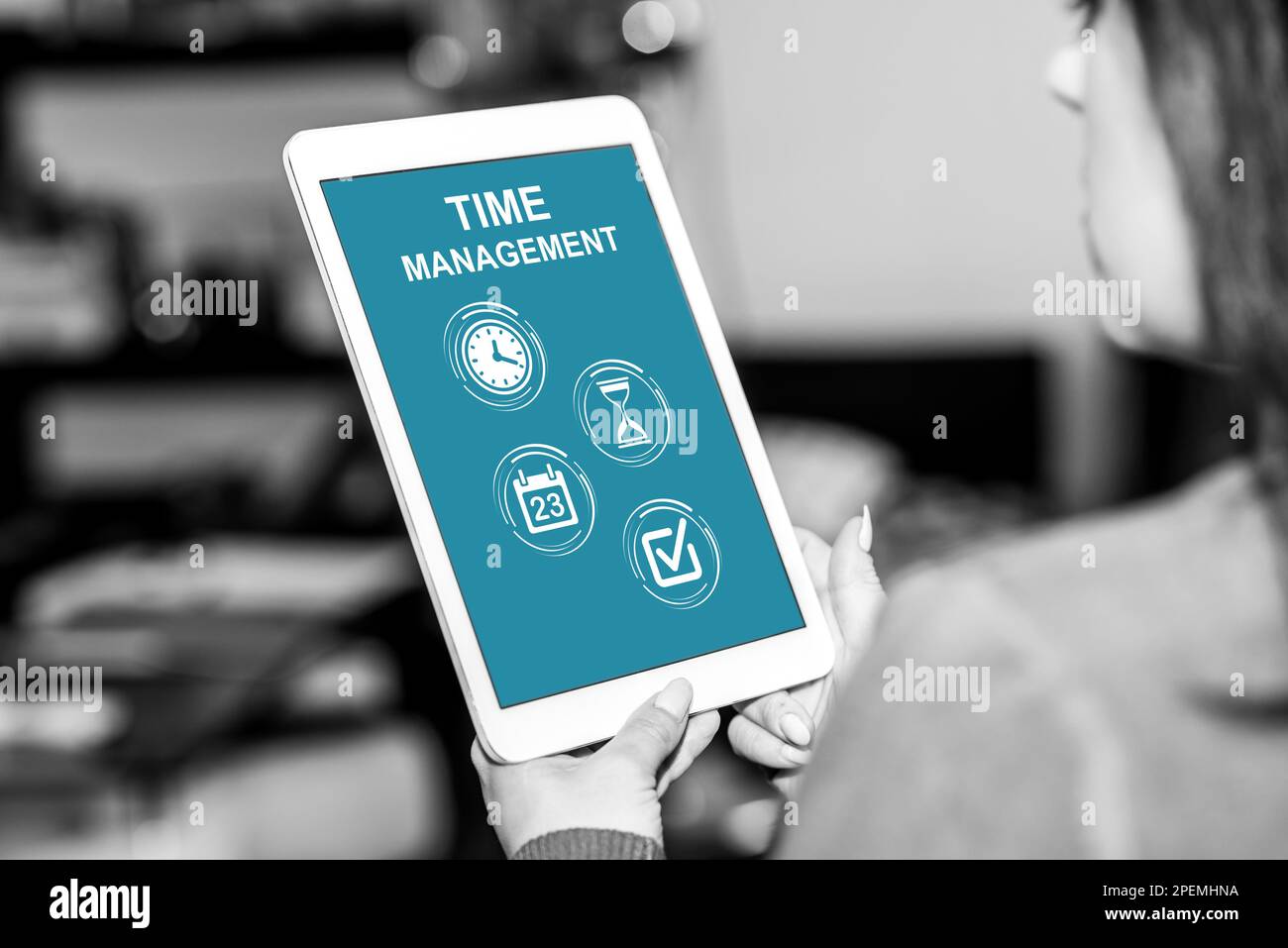Tablet screen displaying a time management concept Stock Photo - Alamy