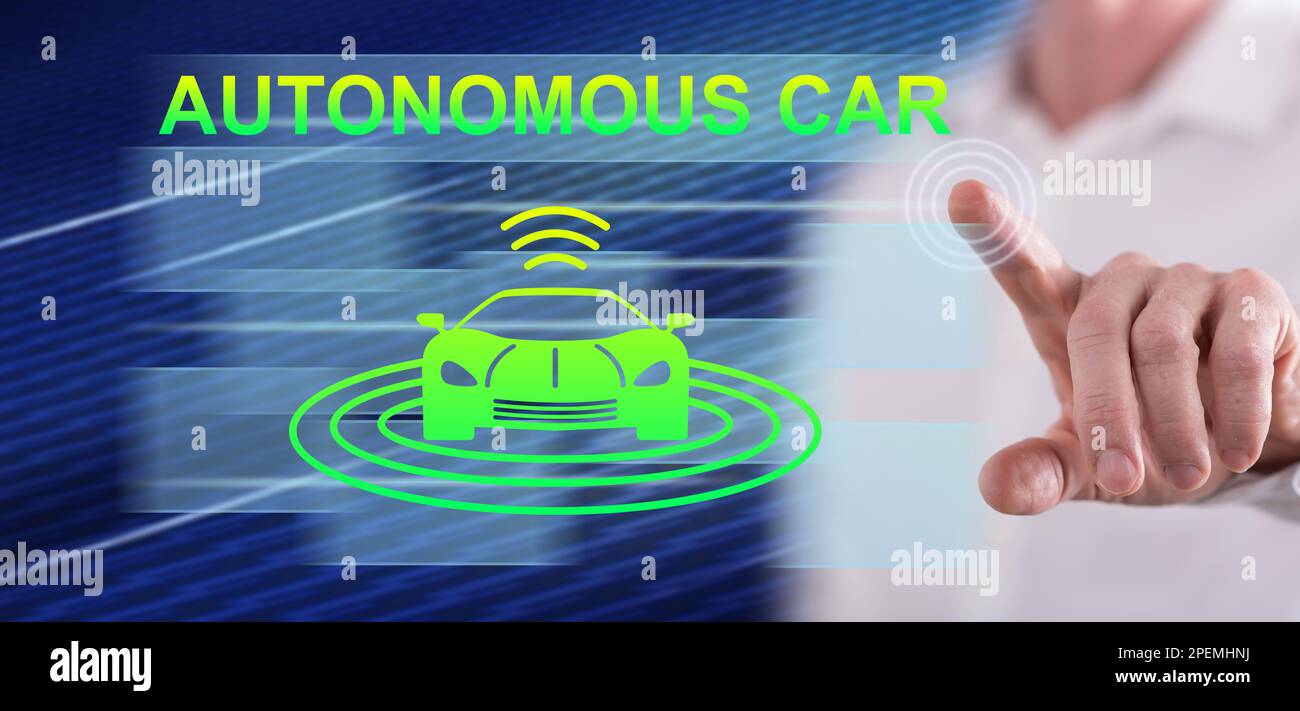 Man touching an autonomous car concept on a touch screen with his ...