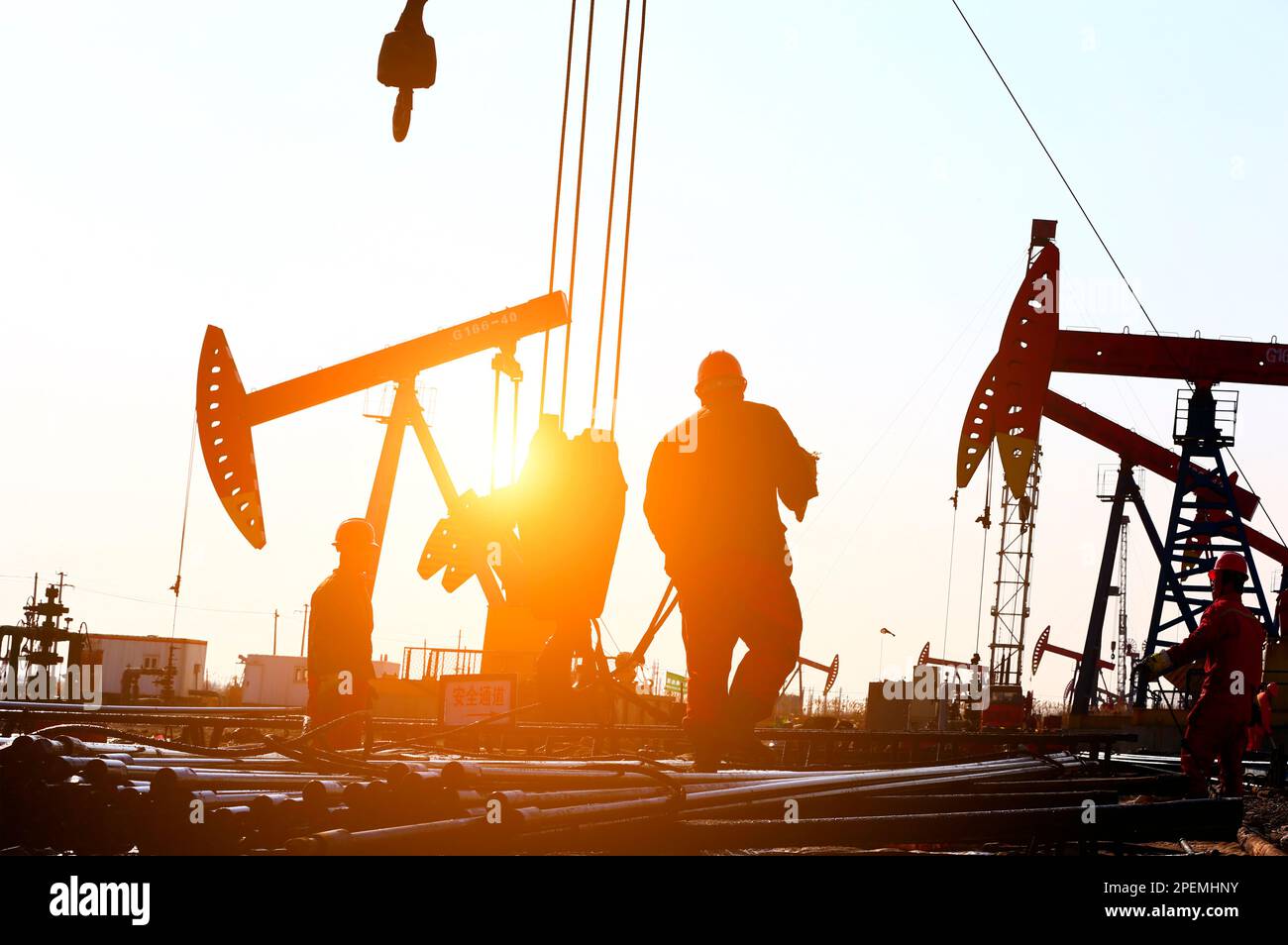 The oil workers at work Stock Photo - Alamy