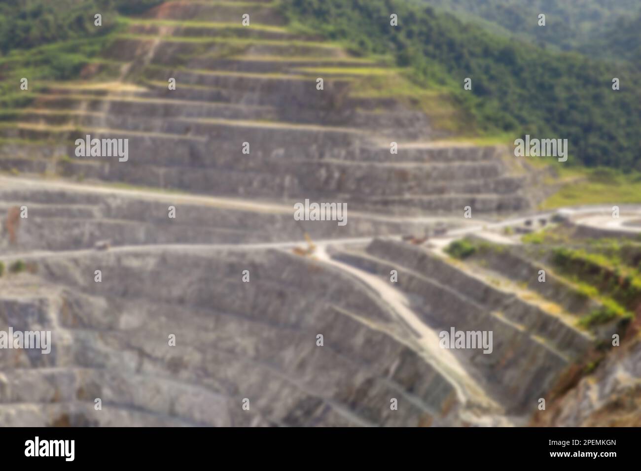 Blurred background of open pit mining. Aerial view of industrial slope ...