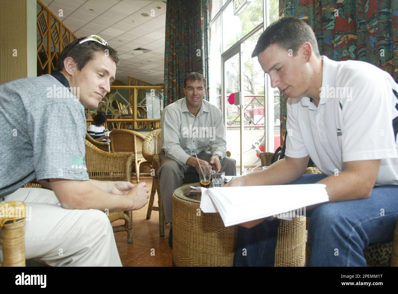 Heath Streak, former Zimbabwean Cricket Captain,center, with Stuart Carlisle, left, and Trevor ...
