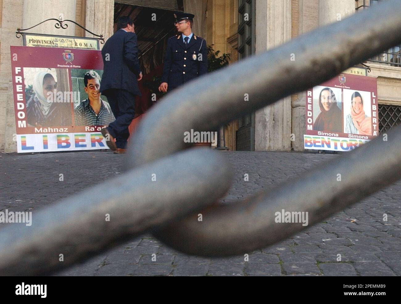 An Italian Rome Province security officer, right, on patrol outside the ...