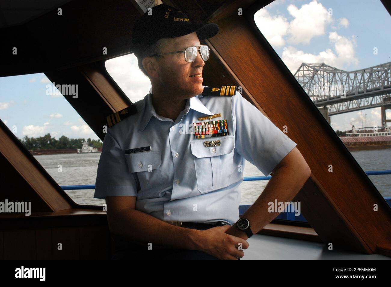 Coast Guard Lt. Cmdr. Jimmy Duckwork looks for suspicious activity ...