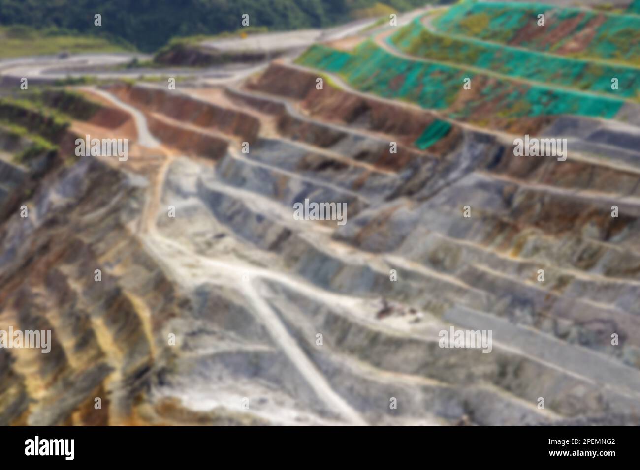Blurred background of open pit mining. Aerial view of industrial slope ...