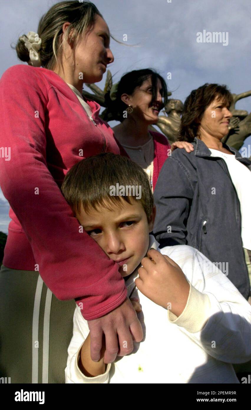 Gypsy women with their children attend a mass to celebrate the ...