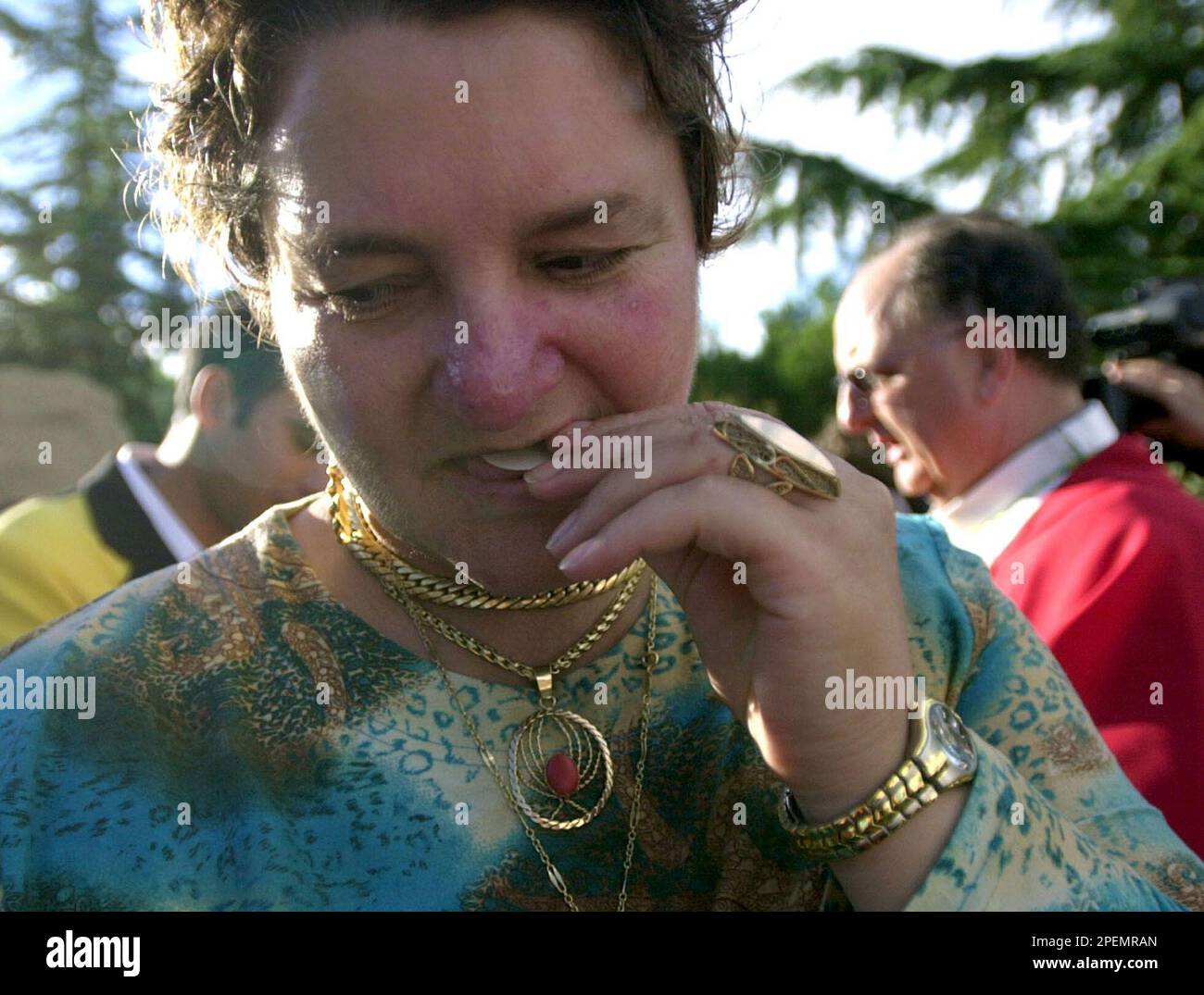 A Gypsy woman receives the Holy Communion during a mass to celebrate ...
