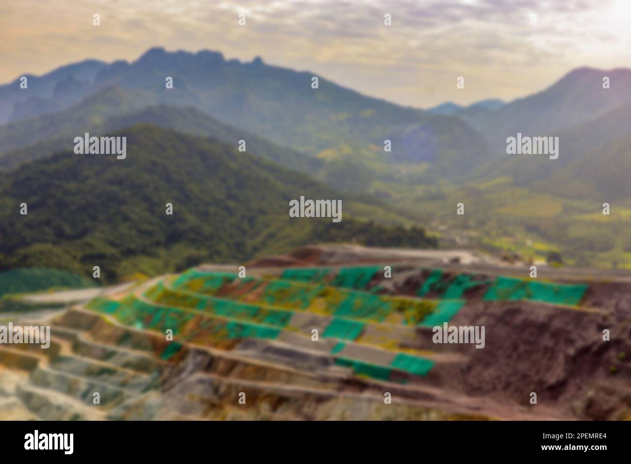 Blurred background of open pit mining. Aerial view of industrial slope ...